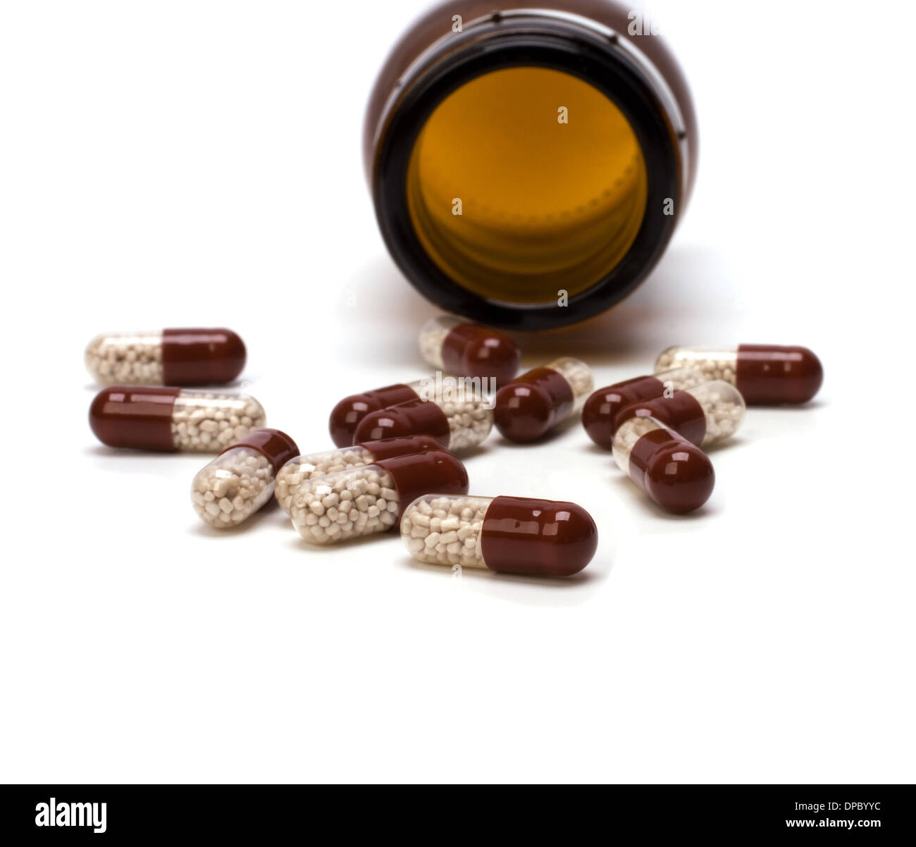 Capsules isolated on white background Stock Photo - Alamy