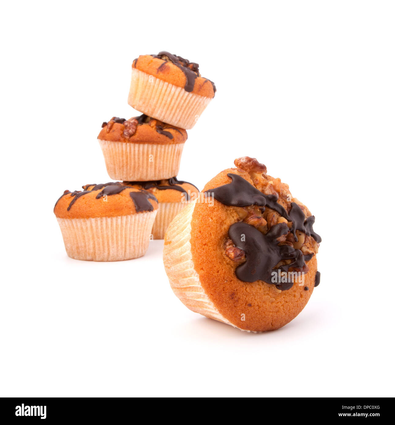 Stacked muffins isolated on white background Stock Photo - Alamy