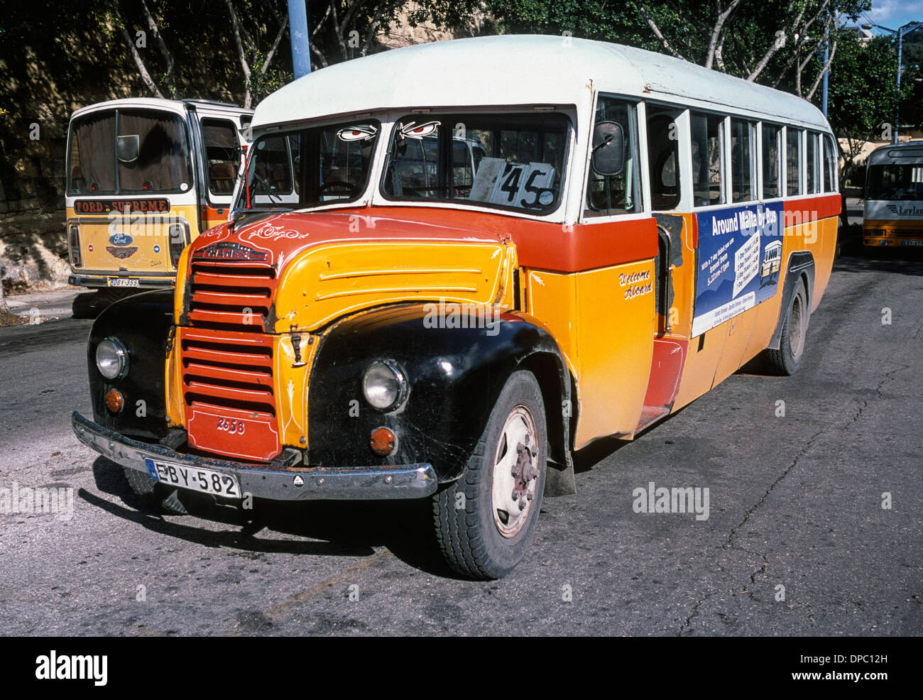 Yellow bus in Valetta, Malta Stock Photo - Alamy