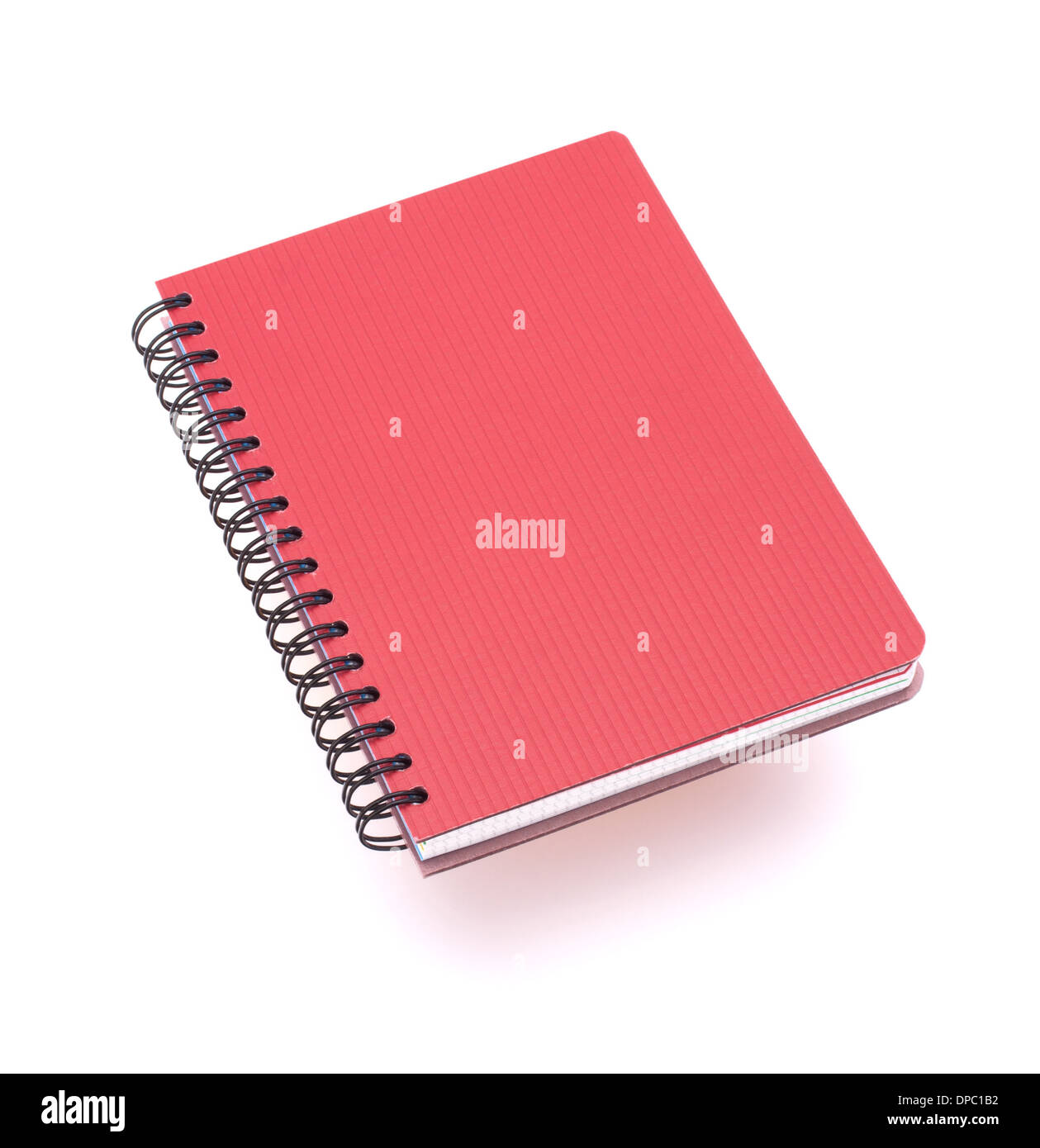 Red notebook isolated on white background cutout Stock Photo - Alamy