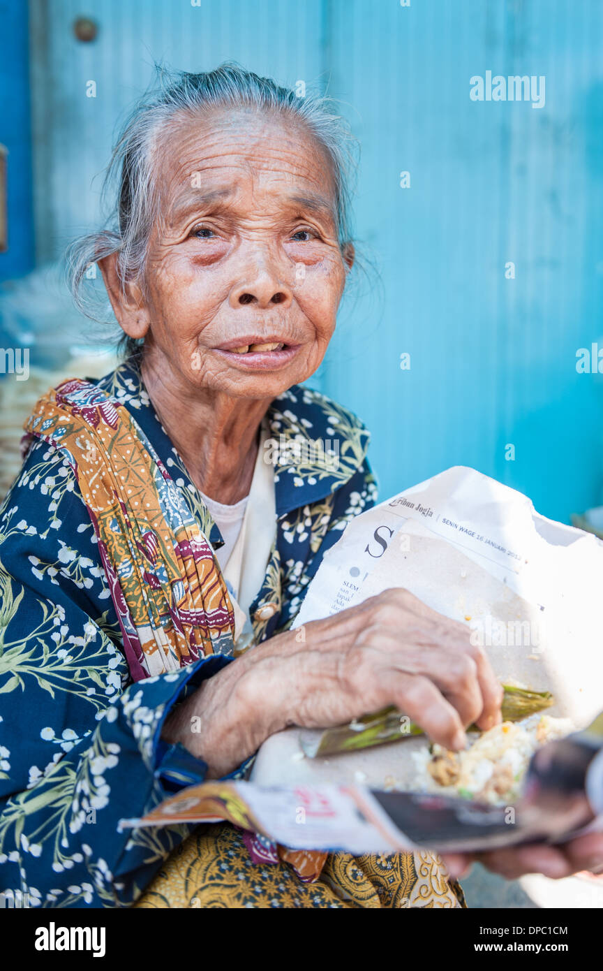 Woman eating rice, street market of Yogyakarta, Indonesia, Asia Stock ...