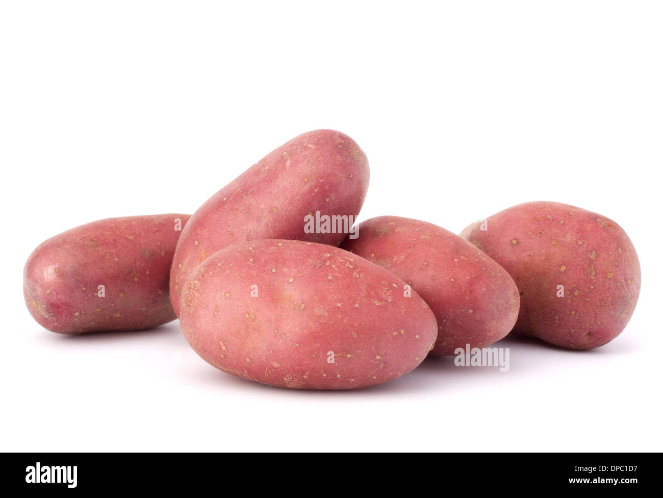 New potato tuber heap isolated on white background cutout Stock Photo ...
