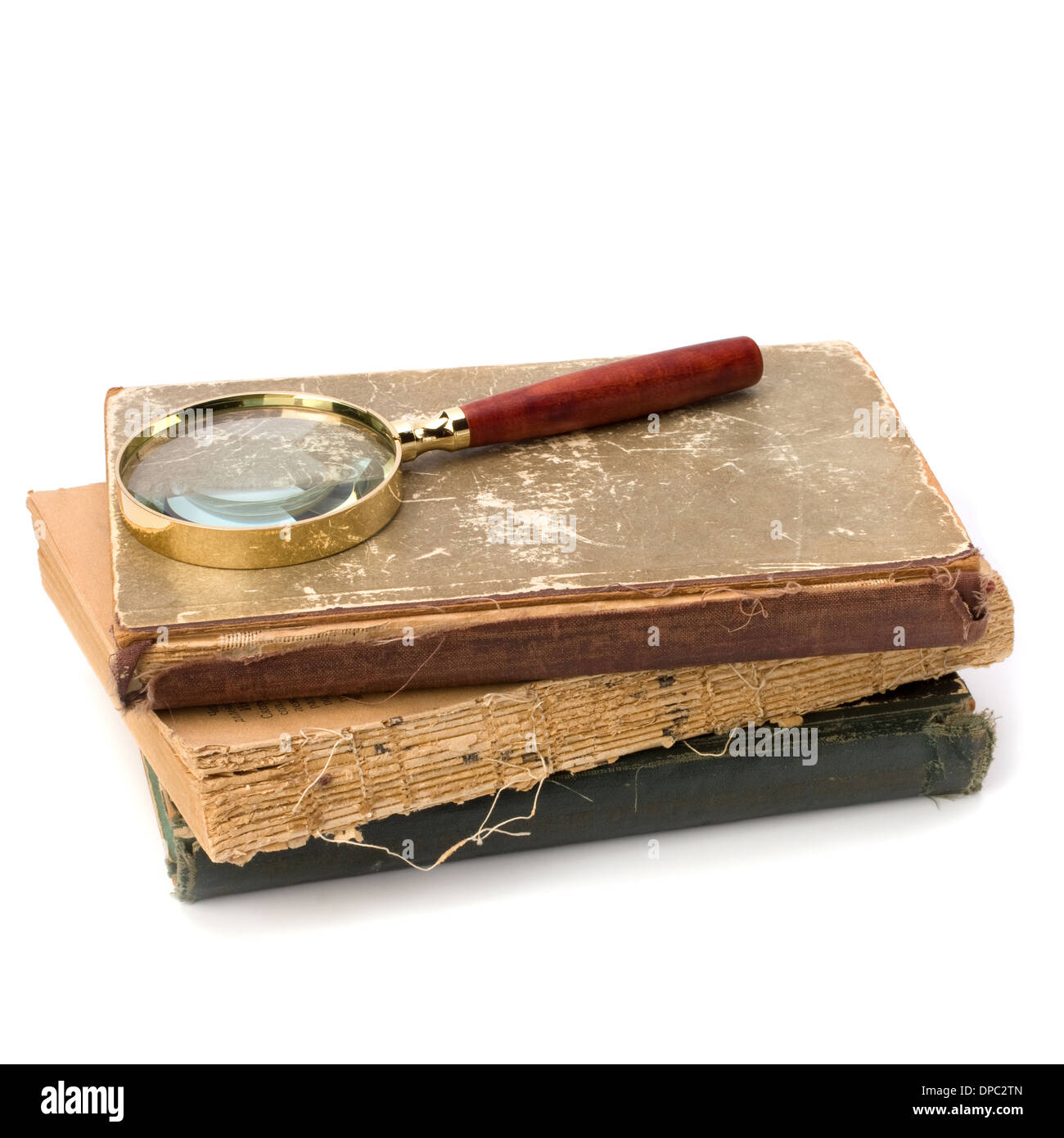 tattered book stack isolated on white background Stock Photo - Alamy