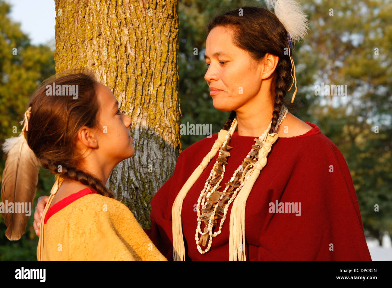 An Native American Lakota Sioux Indian mother talking to her son Stock ...