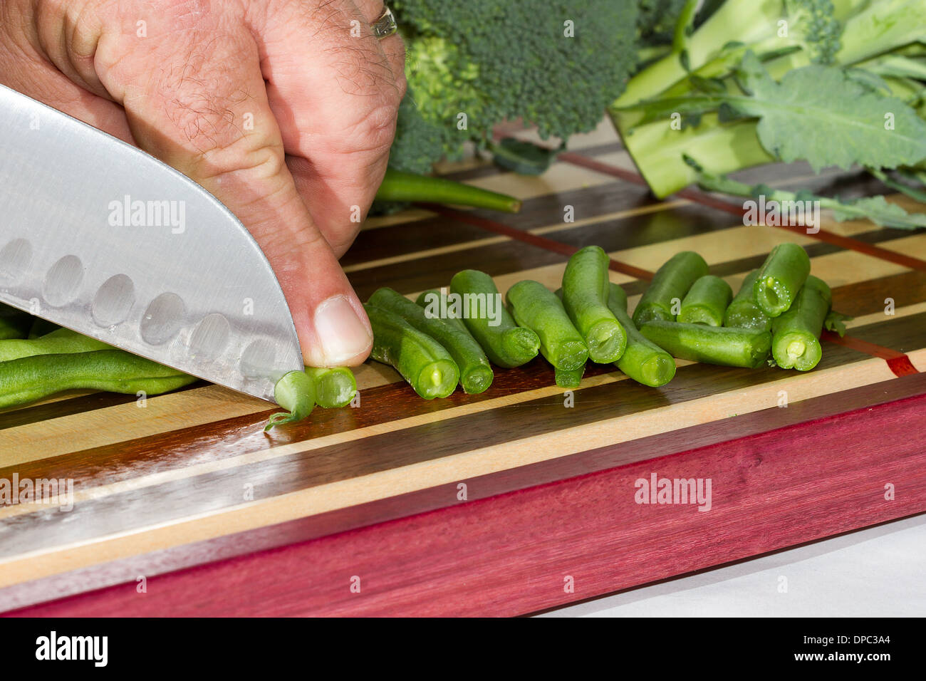 A chef prepares fresh vegetables for cooking Stock Photo - Alamy