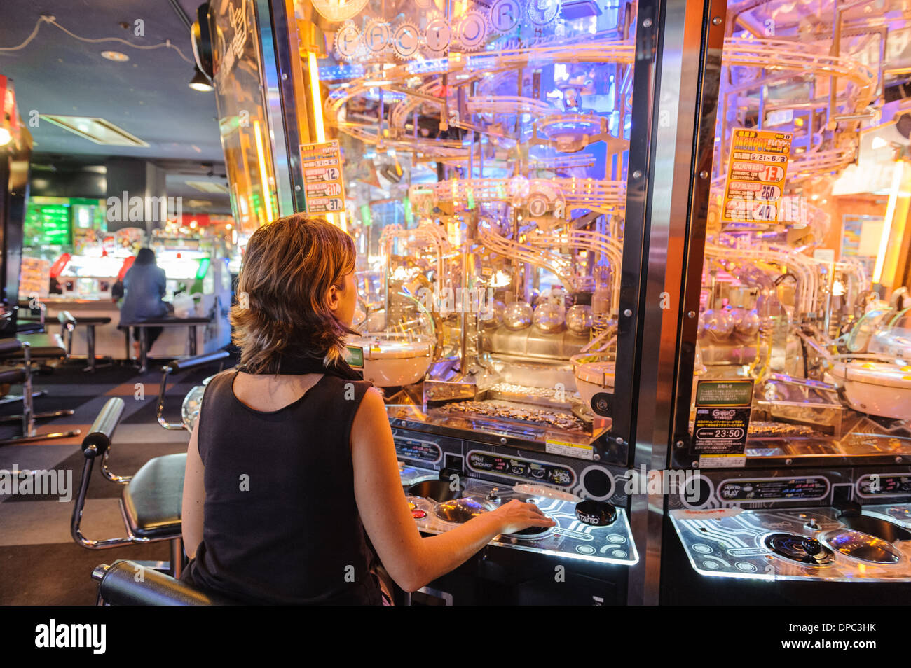 Woman gambling machine hi-res stock photography and images - Alamy