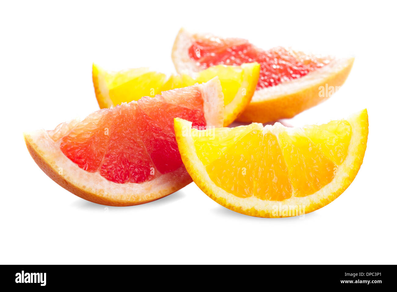 grapefruit's and orange's parts isolated on white, prepared for juice ...
