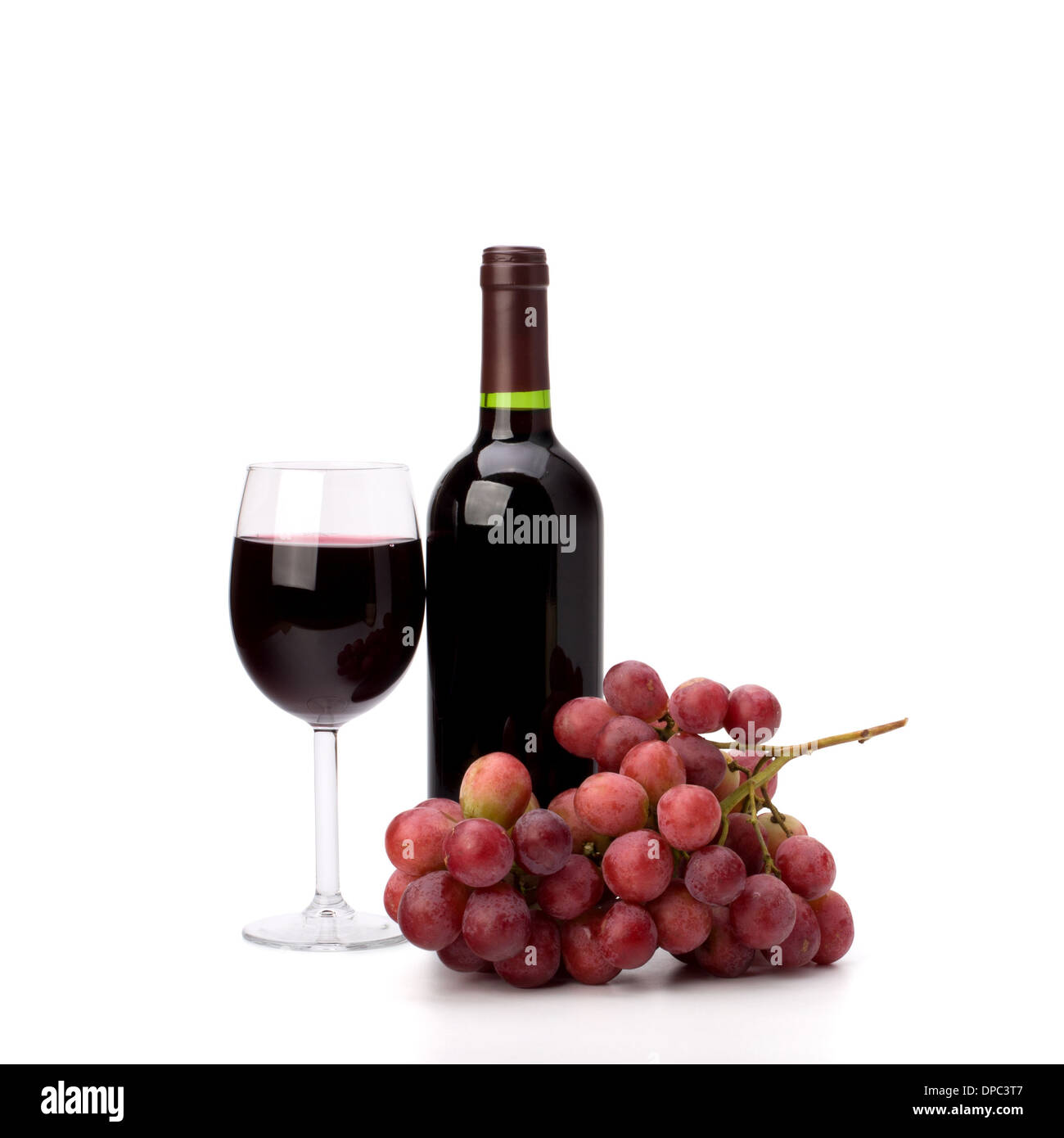 Full red wine glass goblet, bottle and grapes isolated on white ...