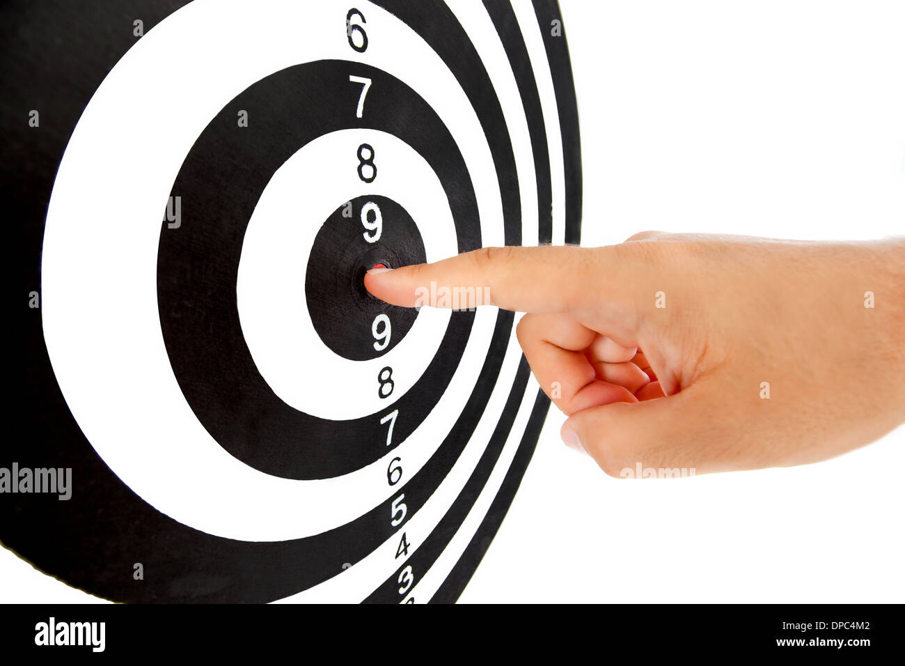 Finger on the center of the target Stock Photo - Alamy