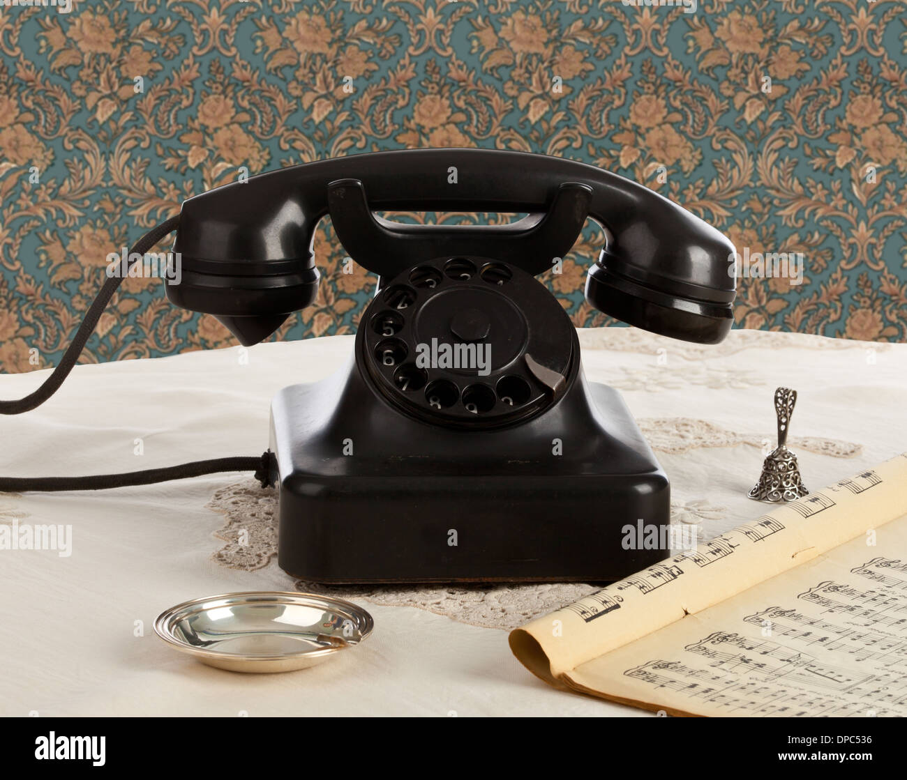 Old retro bakelite telephone on white background Stock Photo - Alamy