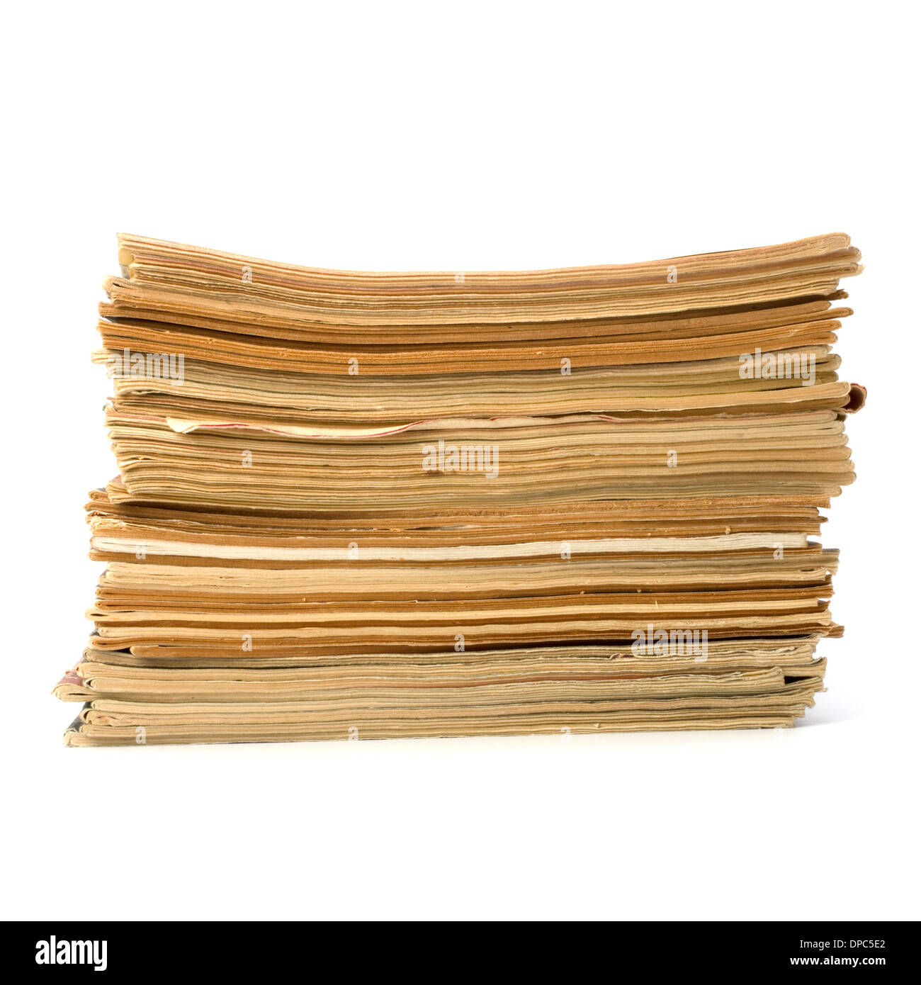 tattered journals stack isolated on white background Stock Photo - Alamy