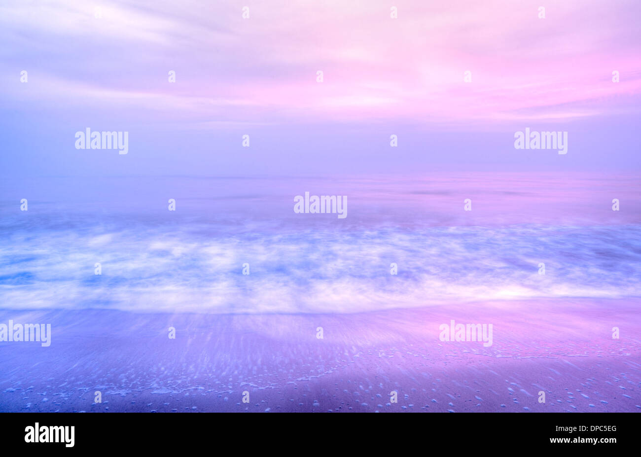 Pink clouds over sea hi-res stock photography and images - Alamy