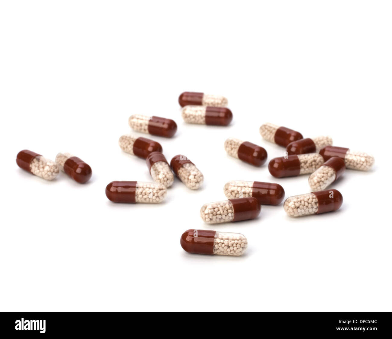 Capsules isolated on white background Stock Photo - Alamy