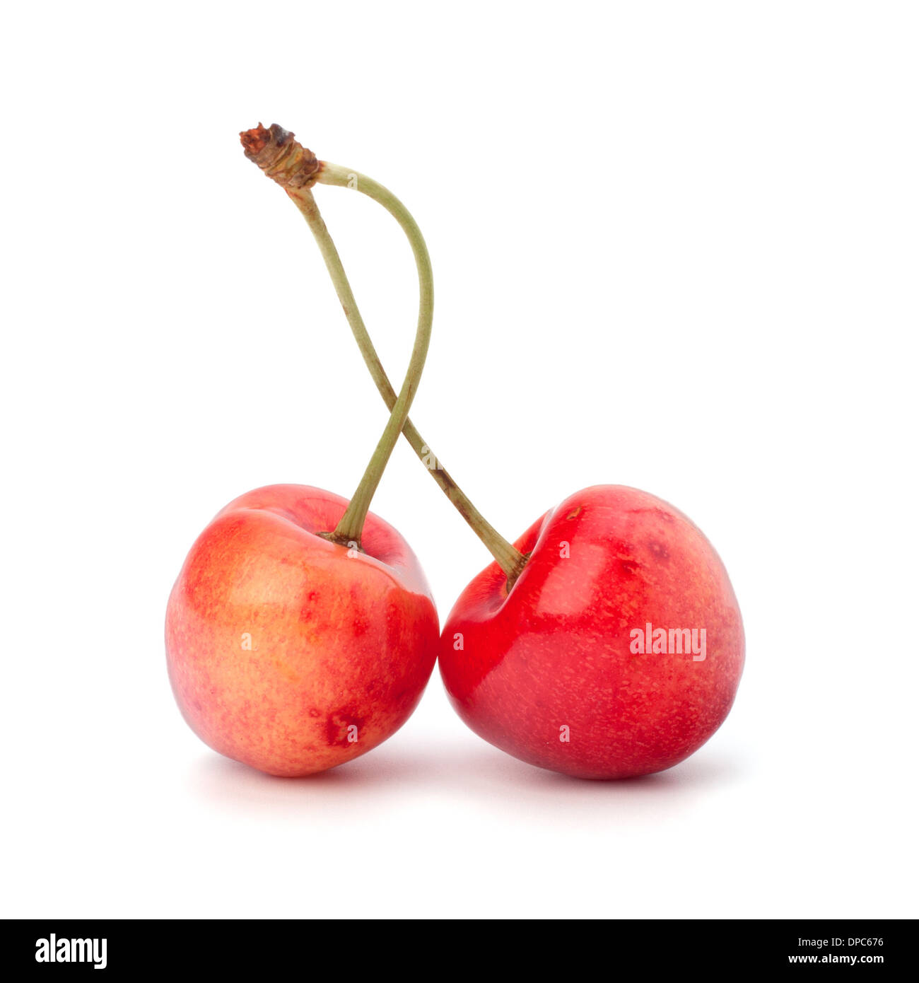 Two cherry berries isolated on white background Stock Photo - Alamy