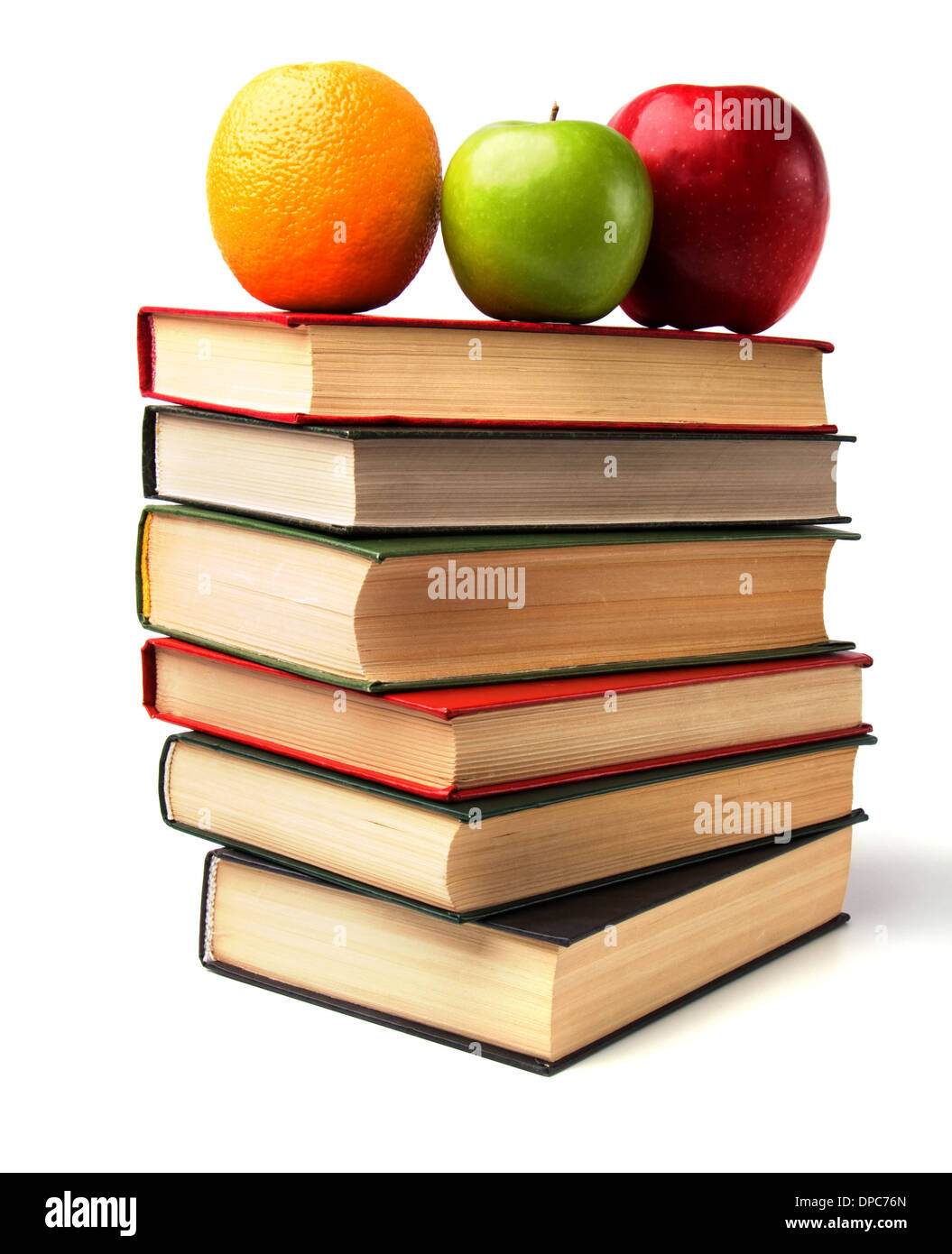 book stack with fruits isolated on white background Stock Photo - Alamy