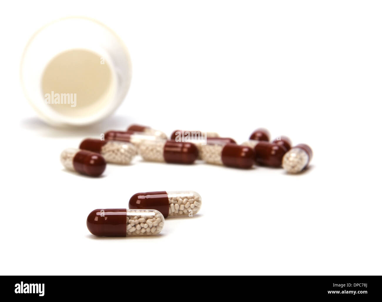 Capsules isolated on white background Stock Photo - Alamy