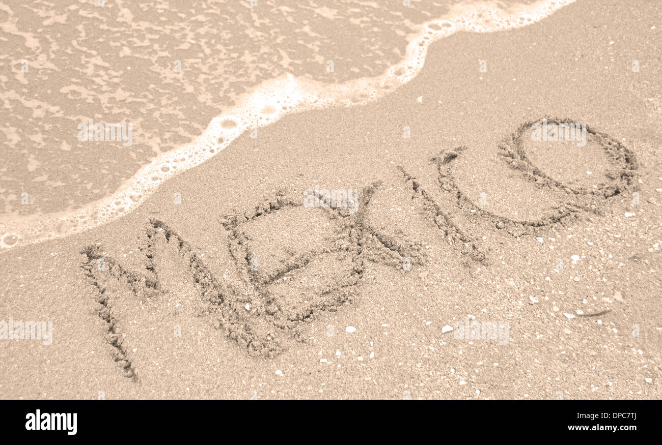 Mexico written in the sand Stock Photo - Alamy