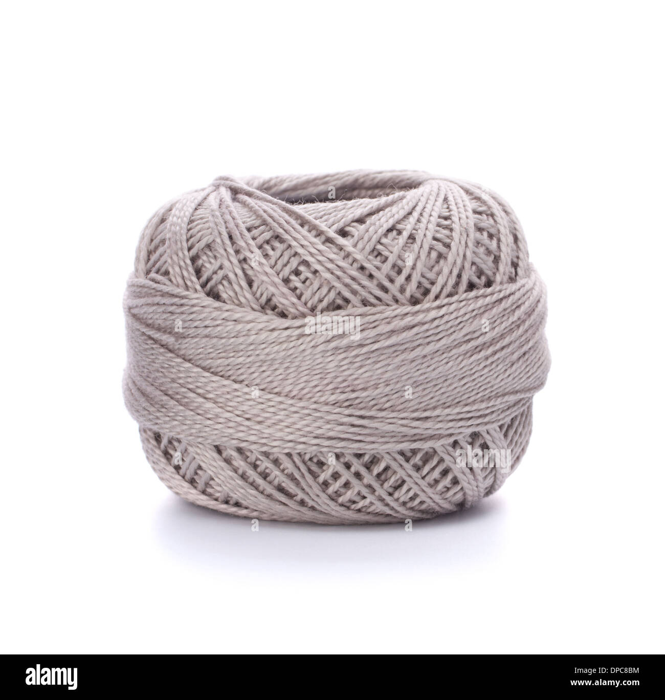 spool of grey thread isolated on white background Stock Photo - Alamy