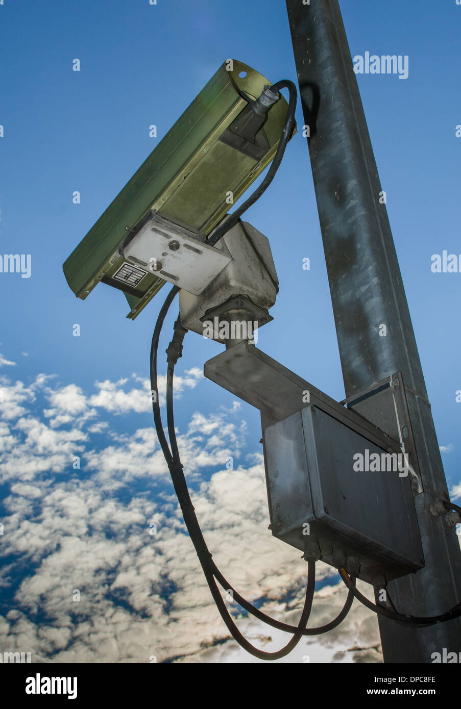 Surveillance Camera And Cloudy Sky Stock Photo - Alamy
