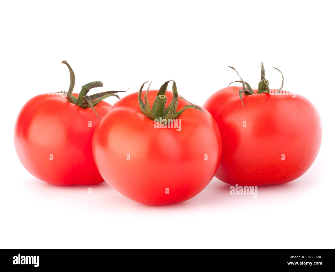 Three tomato vegetables isolated on white background cutout Stock Photo ...
