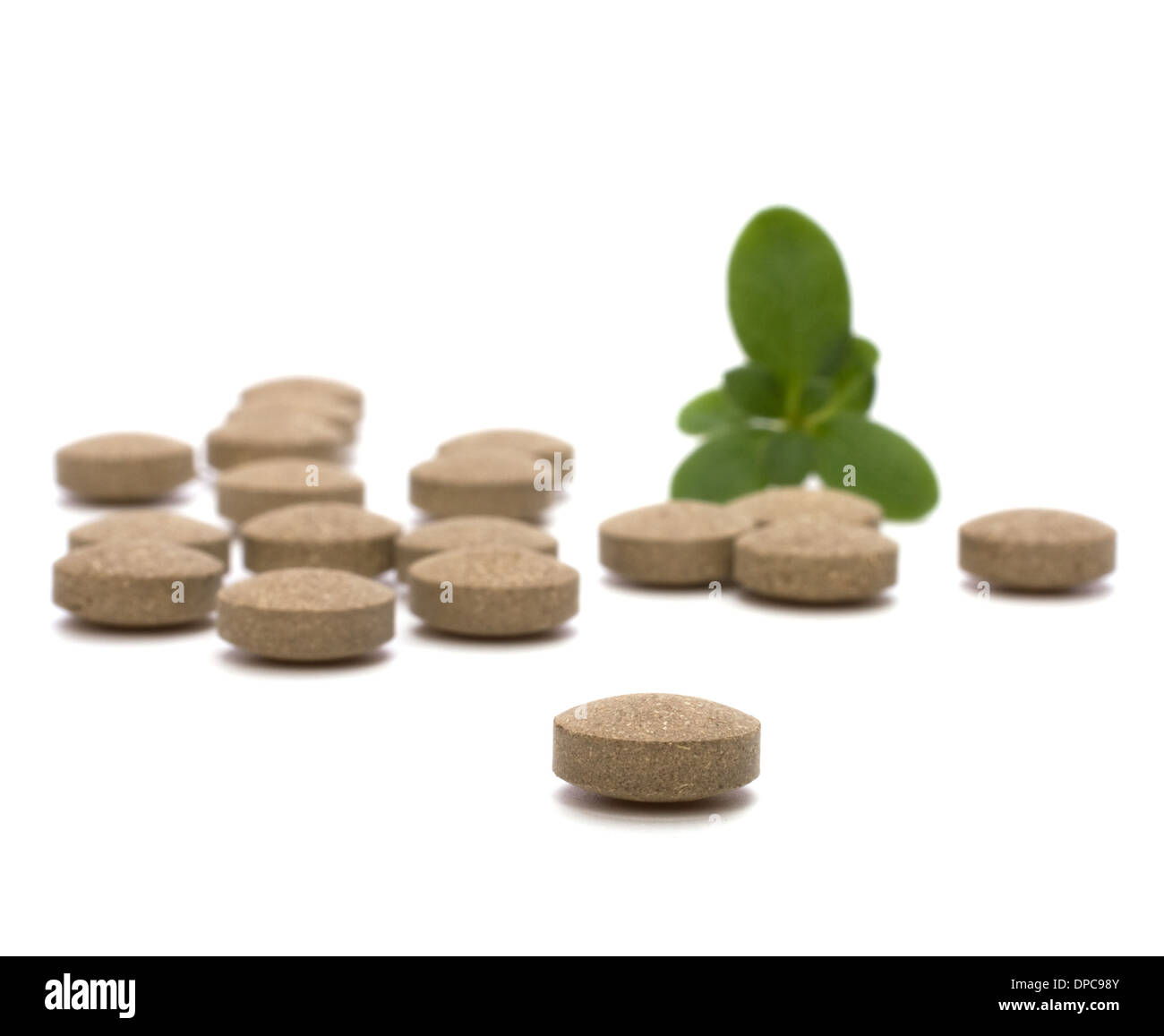 herbal pills isolated on white background Stock Photo - Alamy