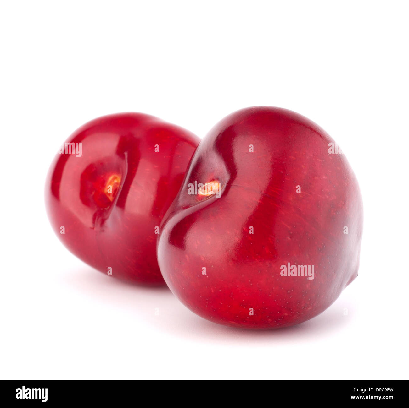 Two heart shaped cherry berries isolated on white background cutout ...