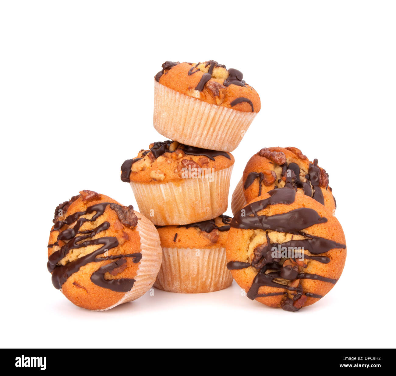 Stacked muffins isolated on white background Stock Photo - Alamy