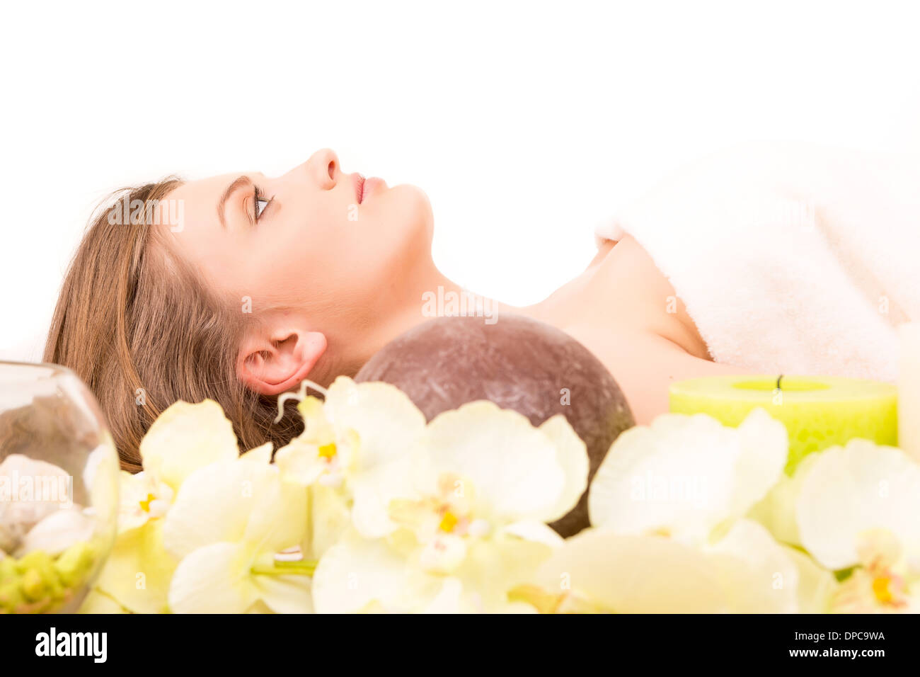 A young beautiful woman relaxing at a spa (wellness concept Stock Photo ...