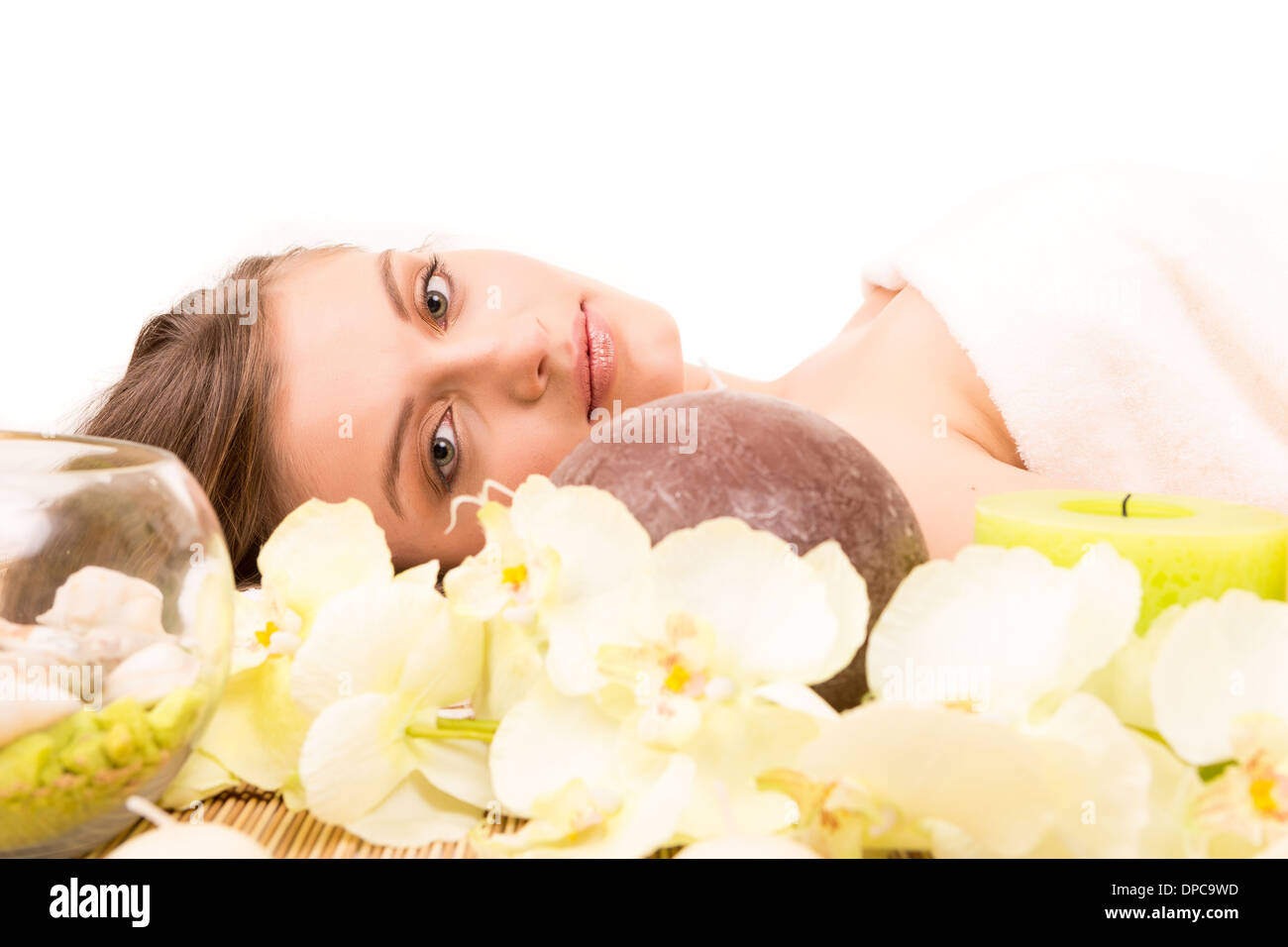 A young beautiful woman relaxing at a spa (wellness concept Stock Photo ...