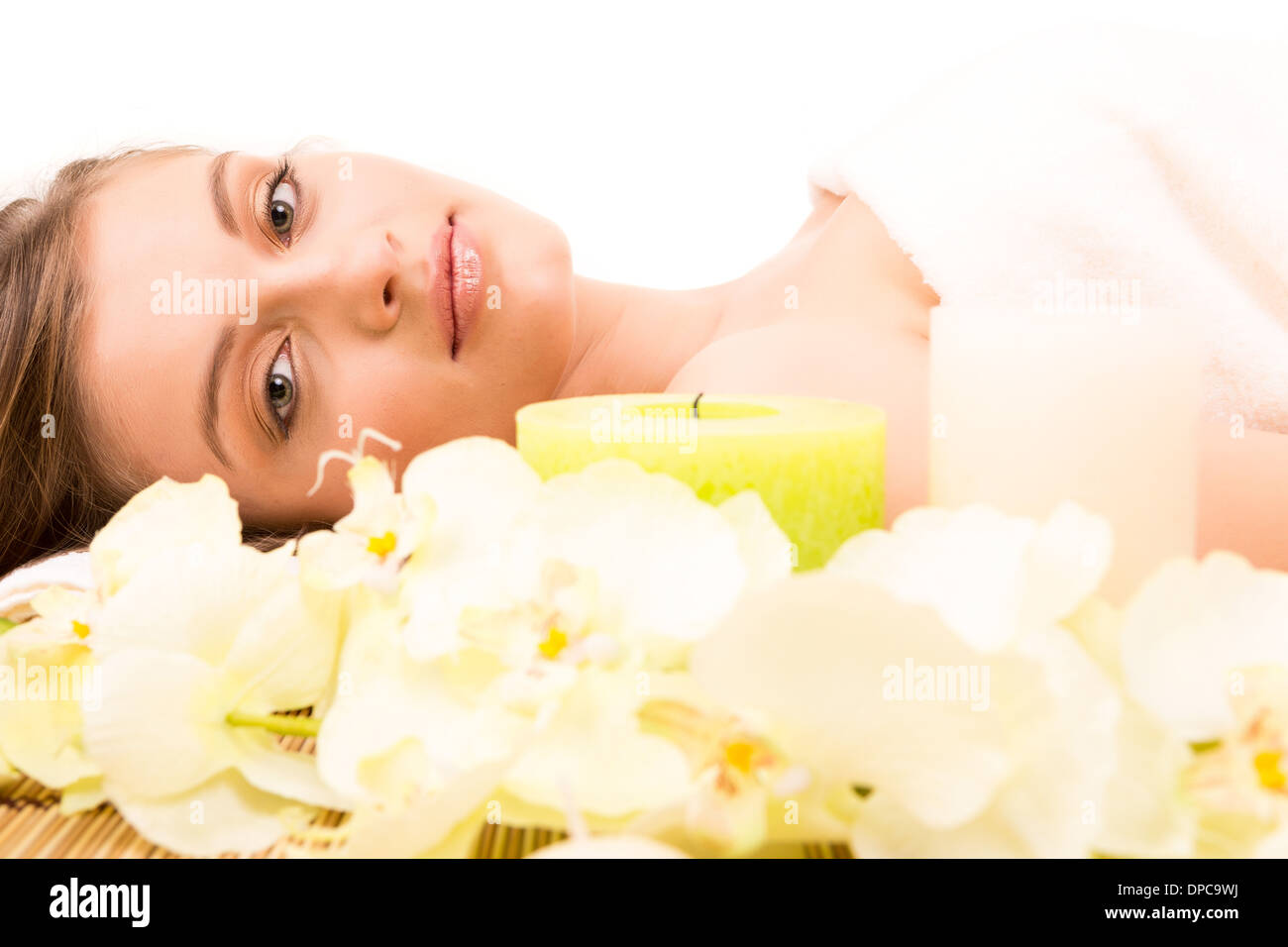 A young beautiful woman relaxing at a spa (wellness concept Stock Photo ...