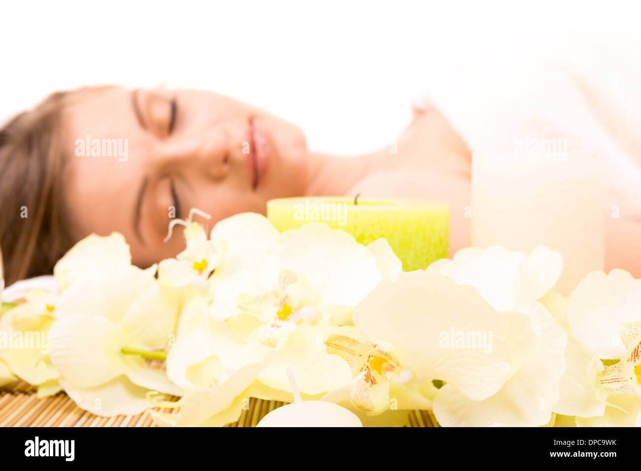A young beautiful woman relaxing at a spa (wellness concept Stock Photo ...