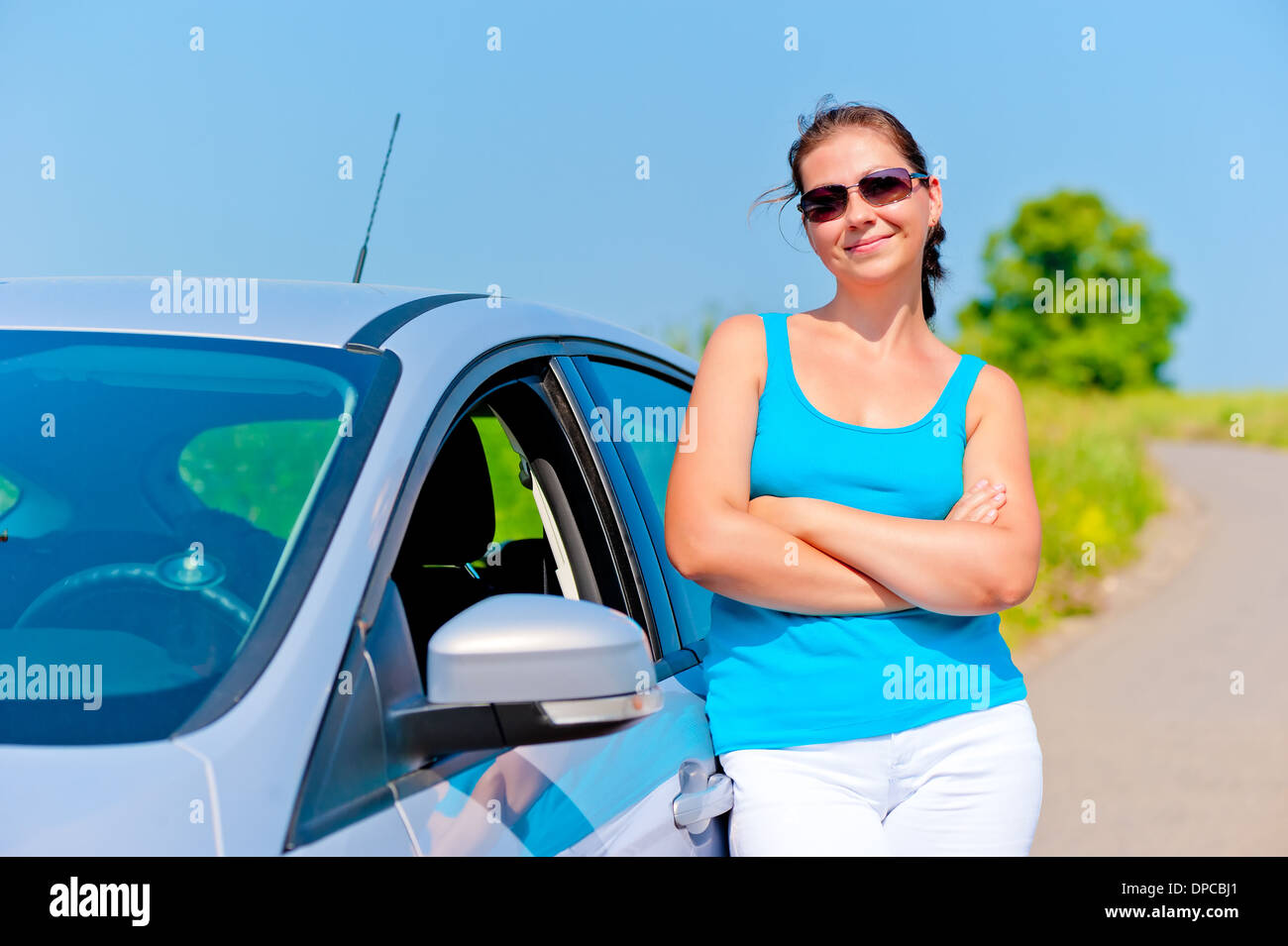 Young woman driver near car hi-res stock photography and images - Alamy