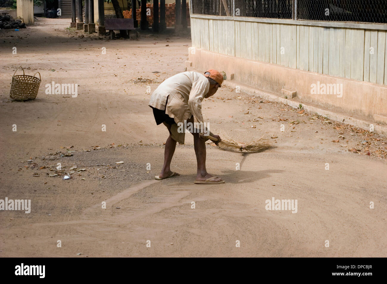 Man sweeping street hi-res stock photography and images - Alamy