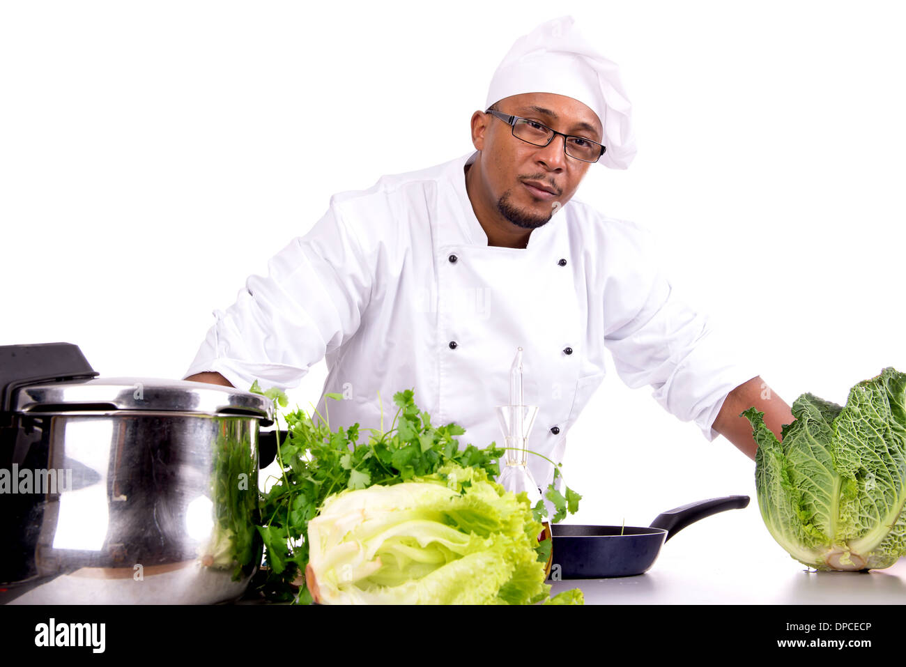 Male chef with fruits and vegetables cooking Stock Photo - Alamy