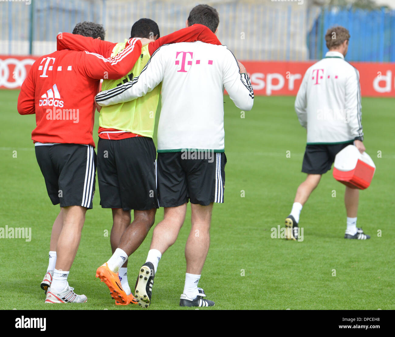 Doha, Qatar. 12th Jan, 2014. Bayer Munich's David Alaba (2-L) leaves ...
