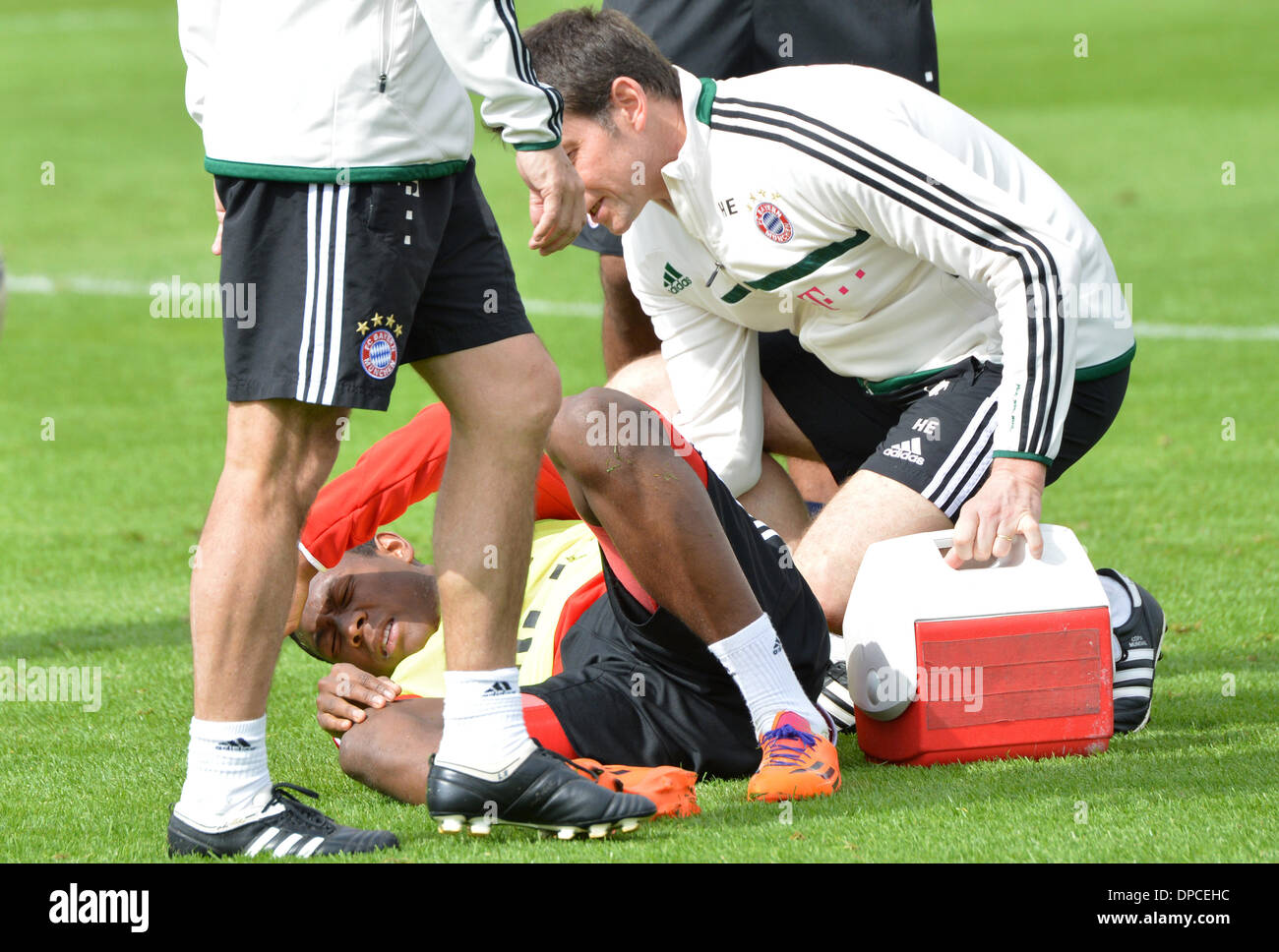Doha, Qatar. 12th Jan, 2014. Bayer Munich's David Alaba lies on the ...