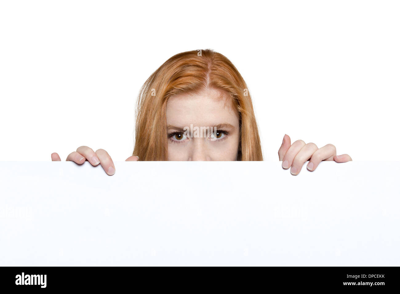 Cute teen girl holding a white sign Stock Photo - Alamy