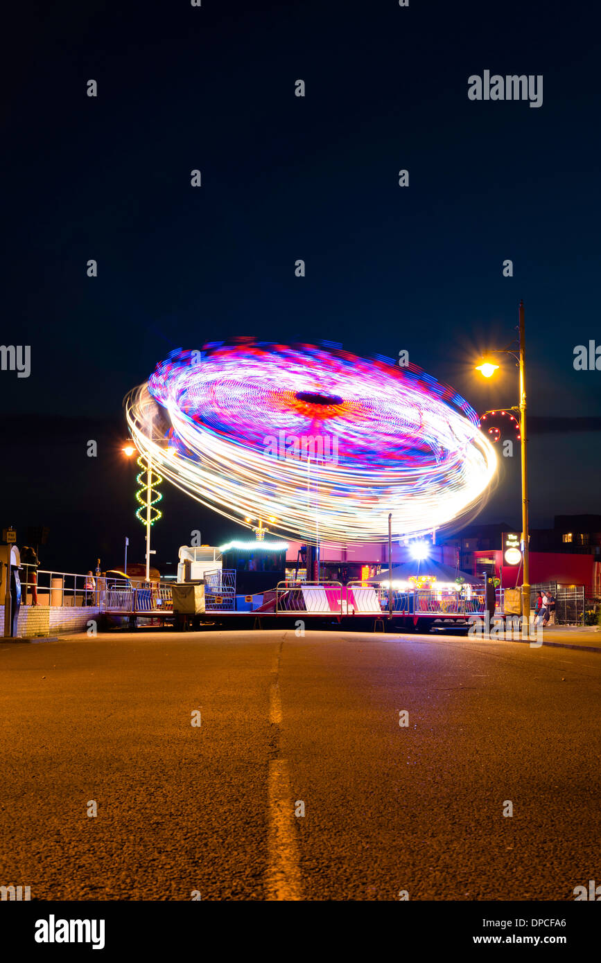 Funfair ride on the road at Bognor Regis, West Sussex, UK Stock Photo ...