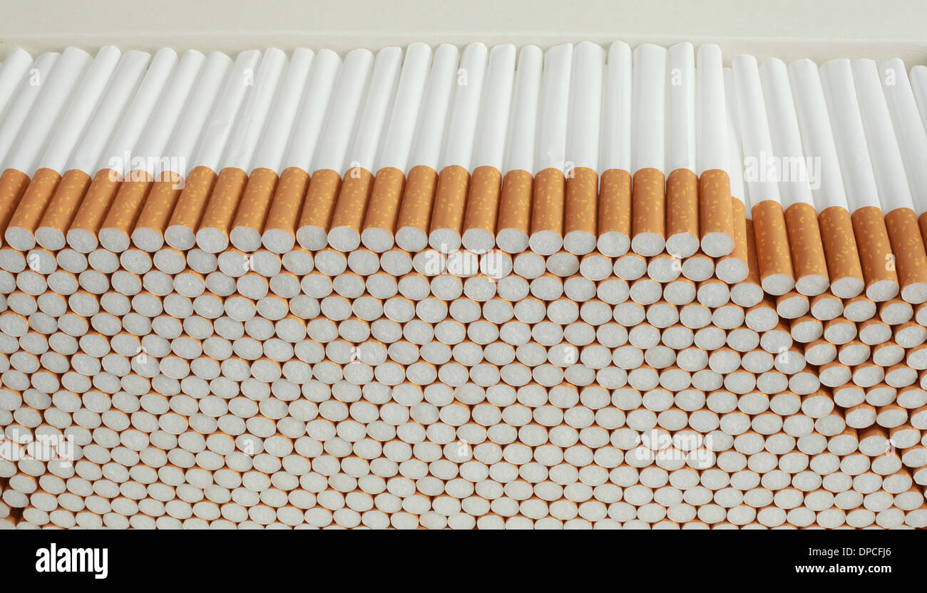 Stack of Cigarettes in a Row Stock Photo - Alamy