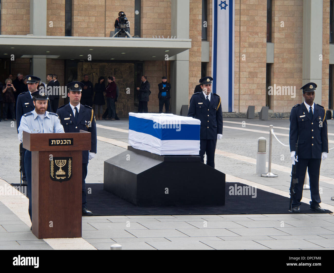 A Knesset Guard honor guard stands around former Prime Minister, Ariel ...