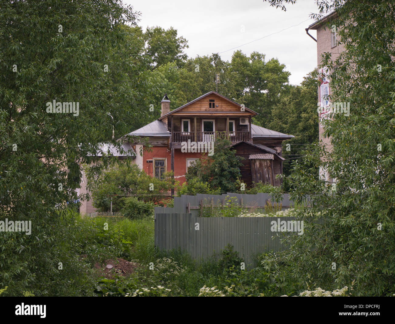 Backyard, houses and balconies in a housing area of the small Russian ...
