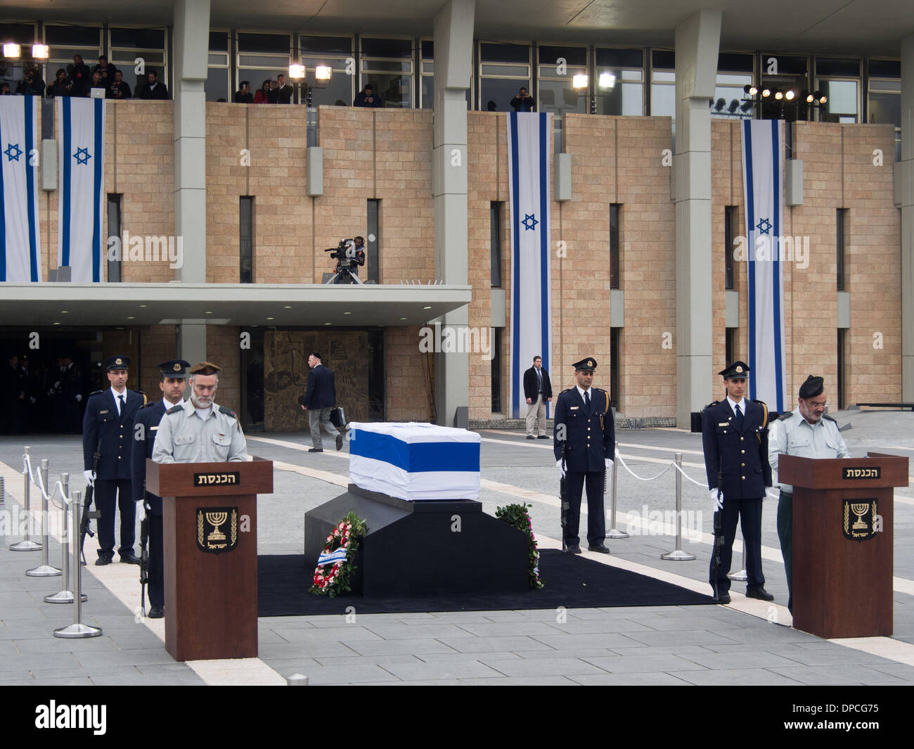 A Knesset Guard honor guard stands around former Prime Minister, Ariel ...