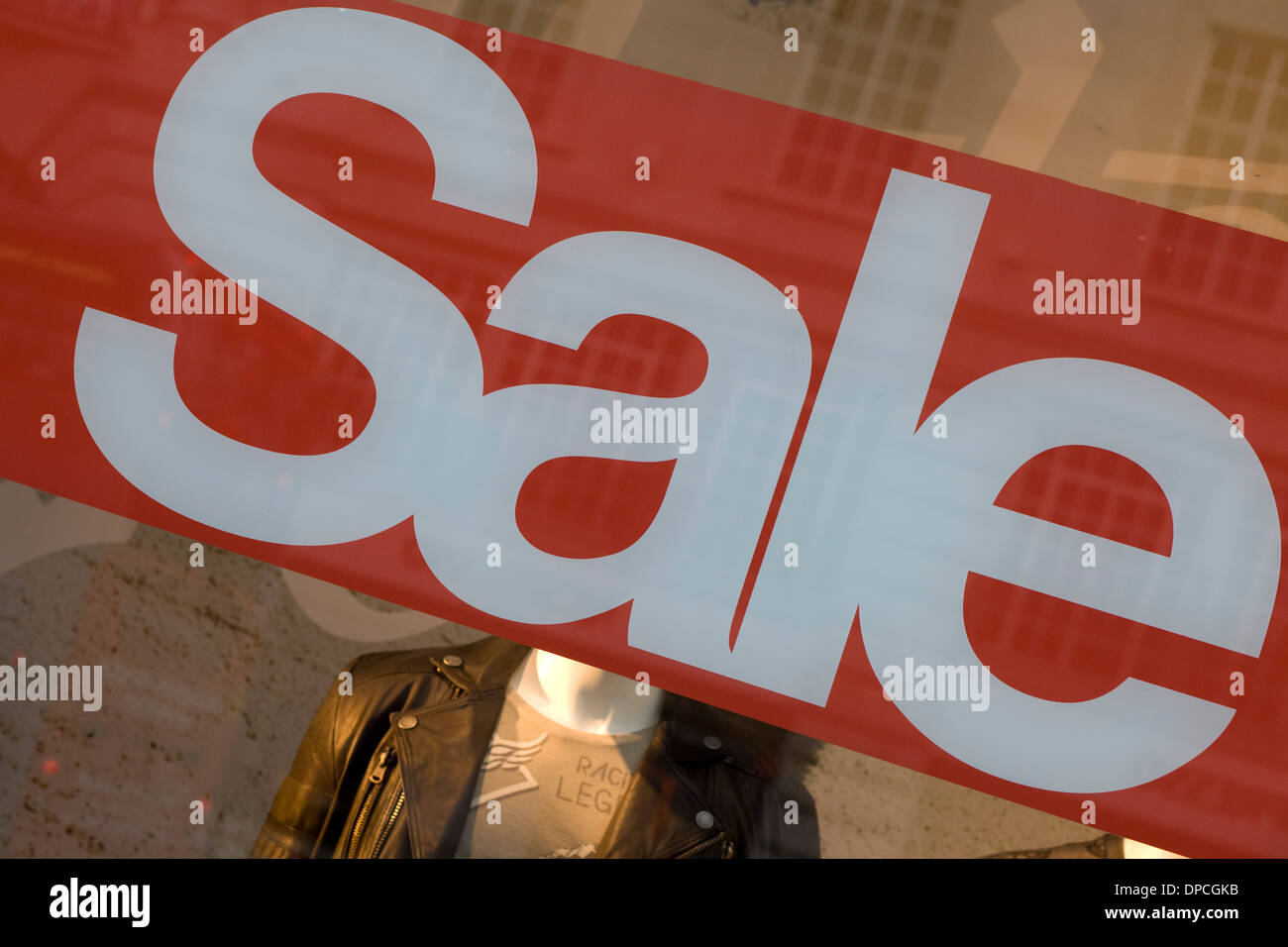 Sale Sign in high street shop windows Stock Photo - Alamy
