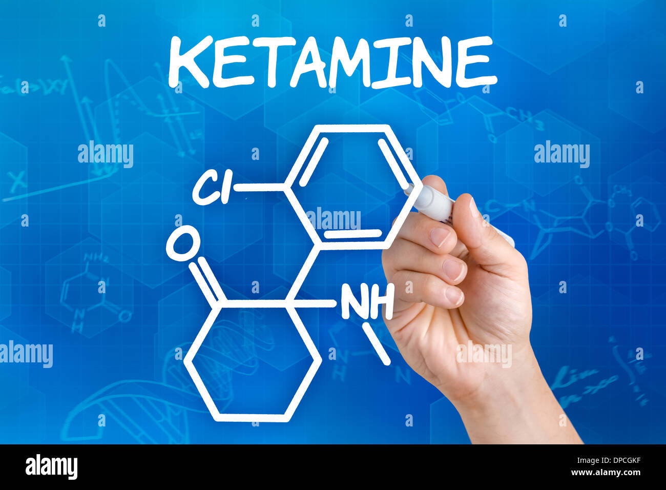 Hand with pen drawing the chemical formula of ketamine Stock Photo - Alamy