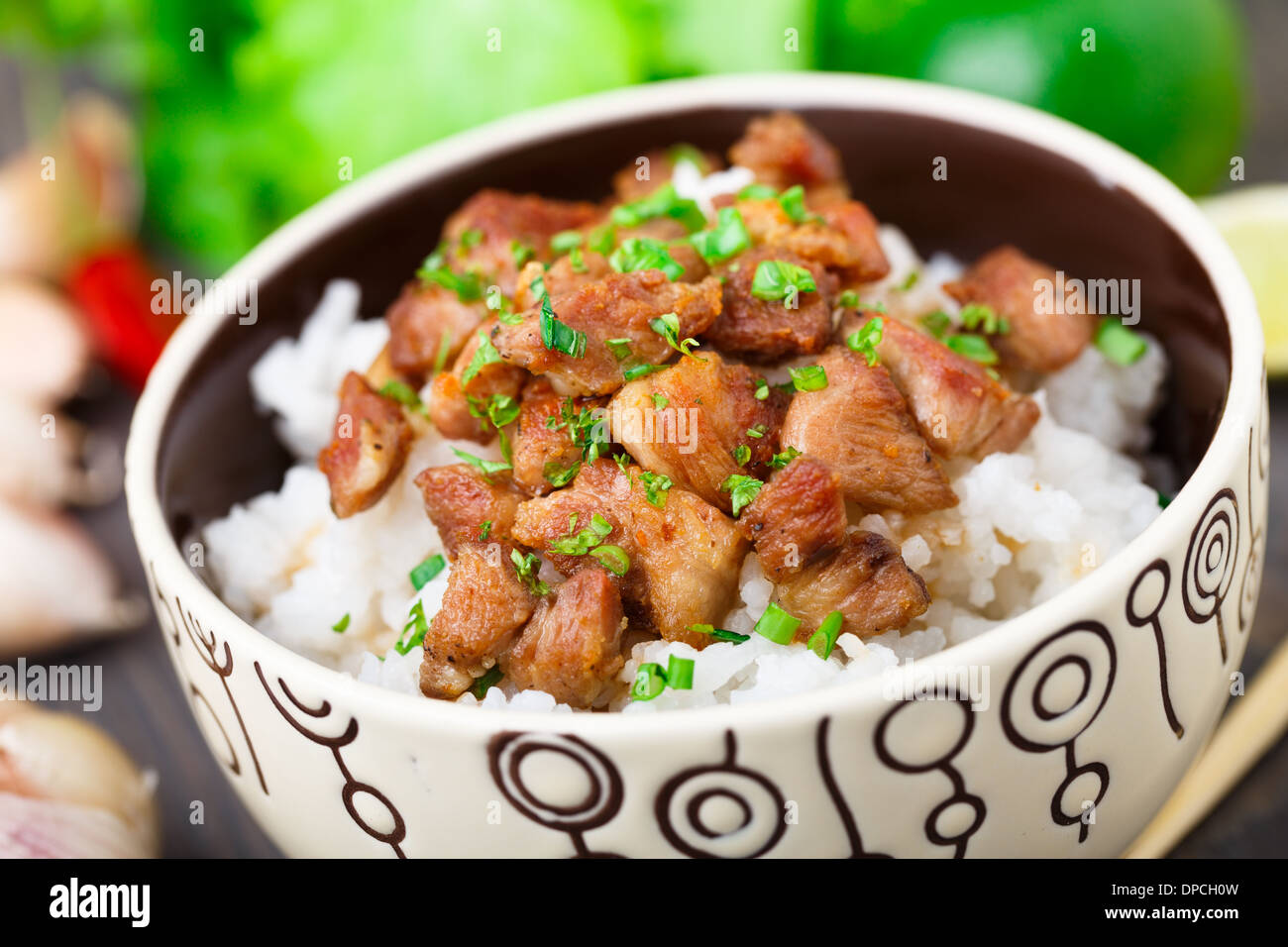 Bowl of rice with meat Stock Photo - Alamy