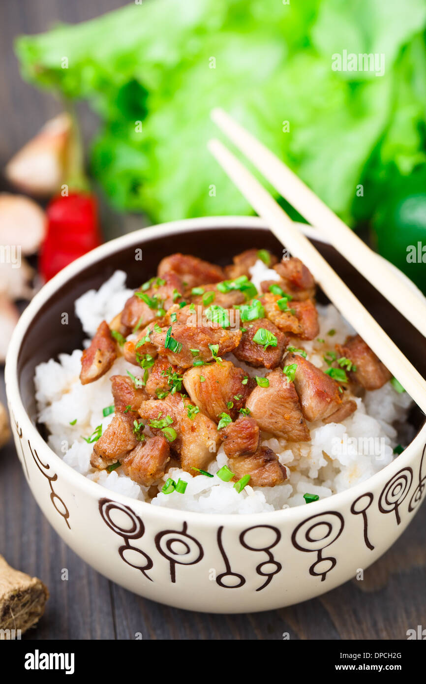 Bowl of rice with meat Stock Photo - Alamy