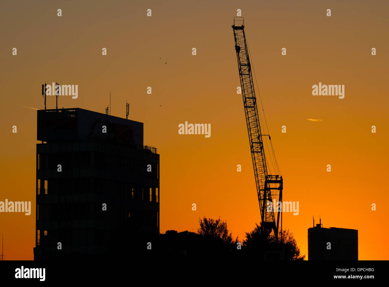 Construction site in the sunset Stock Photo - Alamy
