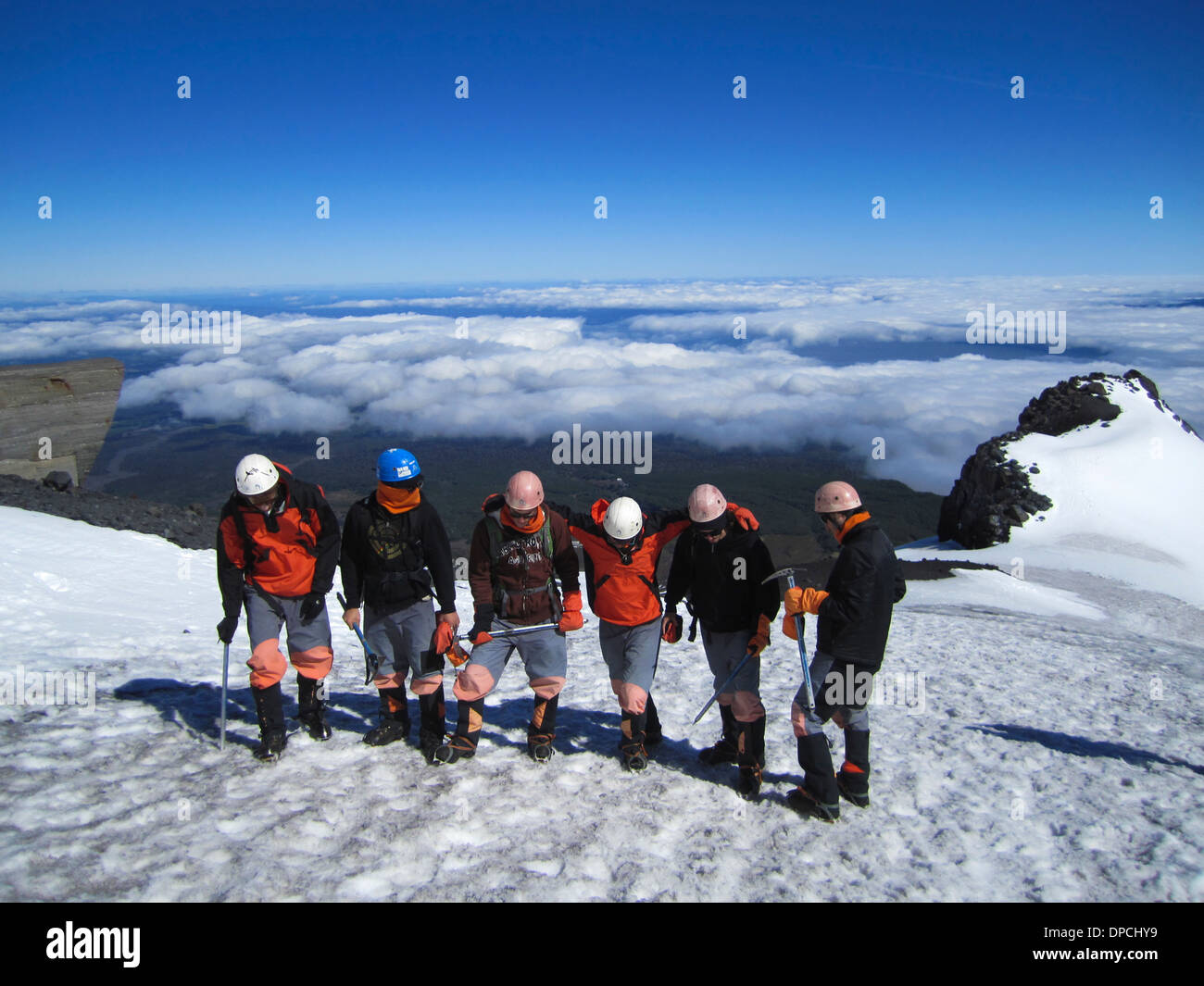 Hikers at the summit of Volcano Villarrica, Pucon, Chile Stock Photo ...