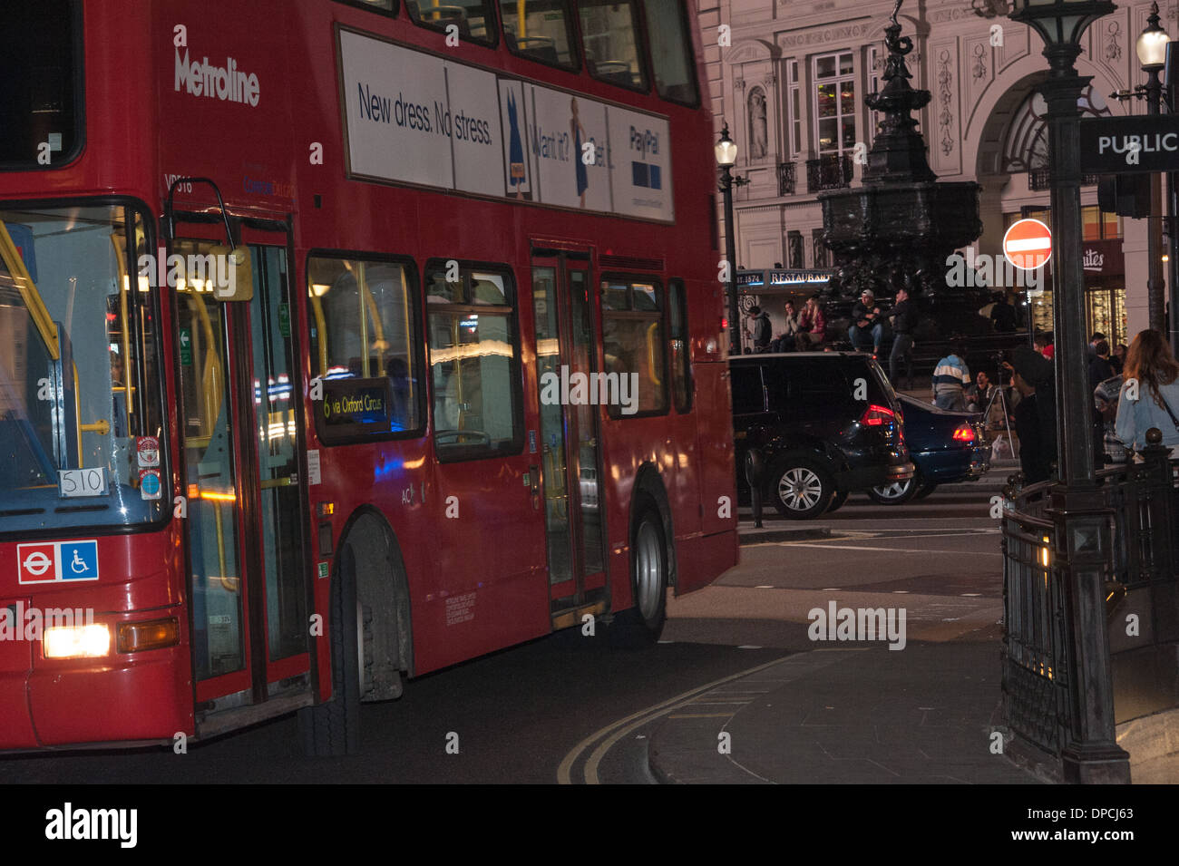 London Piccadilly circus at night with red buses and london cabs Stock ...