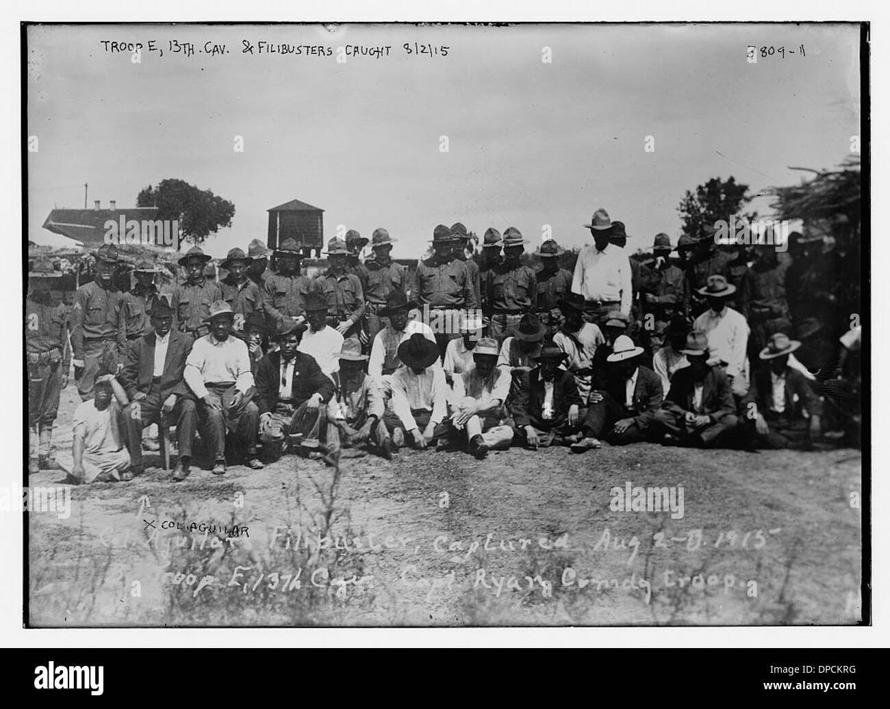 This photograph depicts Troop E of the 13th Cavalry and captured ...